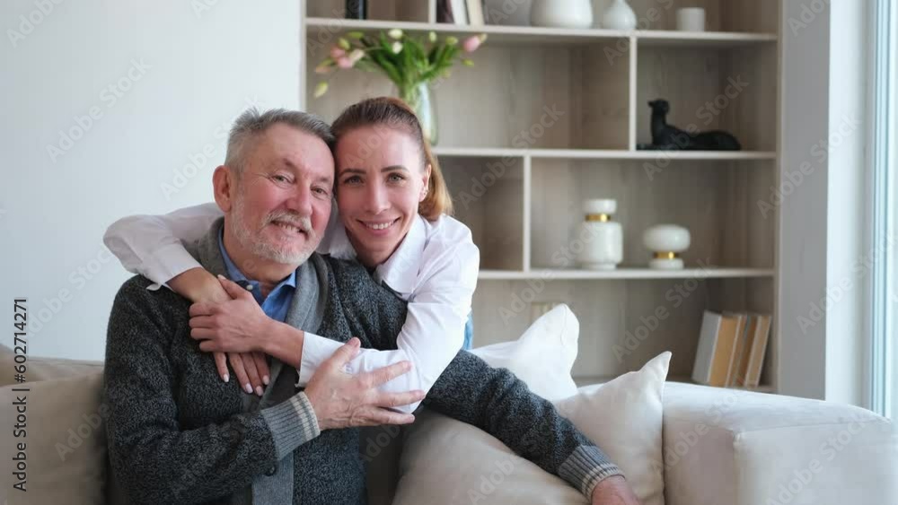 Happy family. Caring grown up daughter hugging loving older man father ...