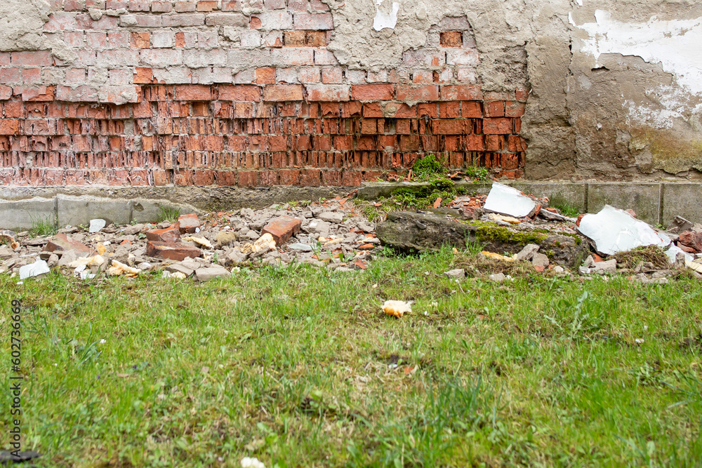 Collapsing wall due to water infiltration, red brick wall deteriorated ...