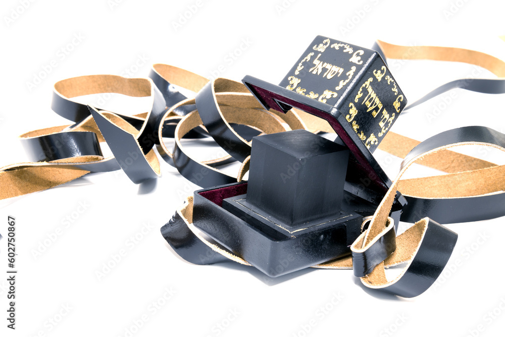 Tefillin or phylacteries . Pair of black leather boxes for the arm and ...
