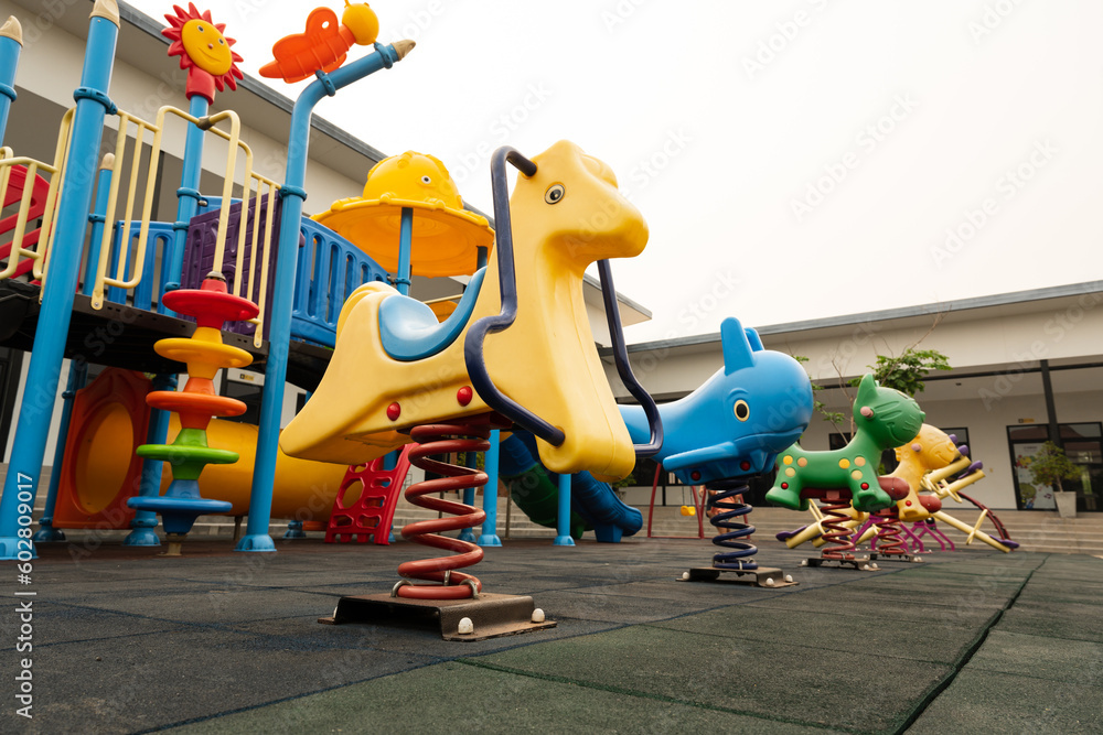 Children playground on yard activities in the school.Outdoor play equipment for kindergarten ...