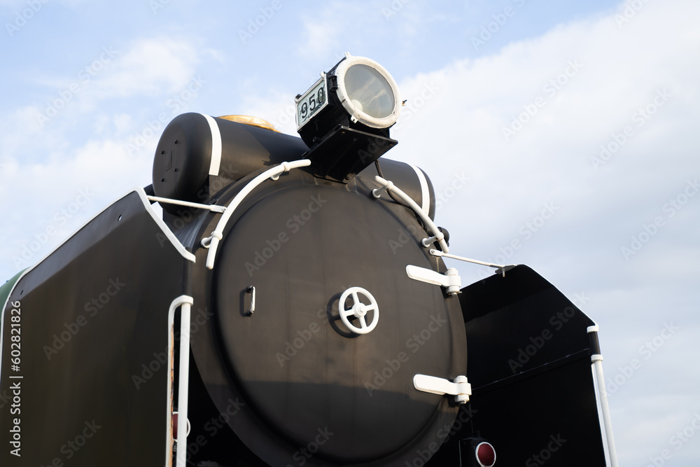 black steam locomotive bright sky background Stock Photo | Adobe Stock