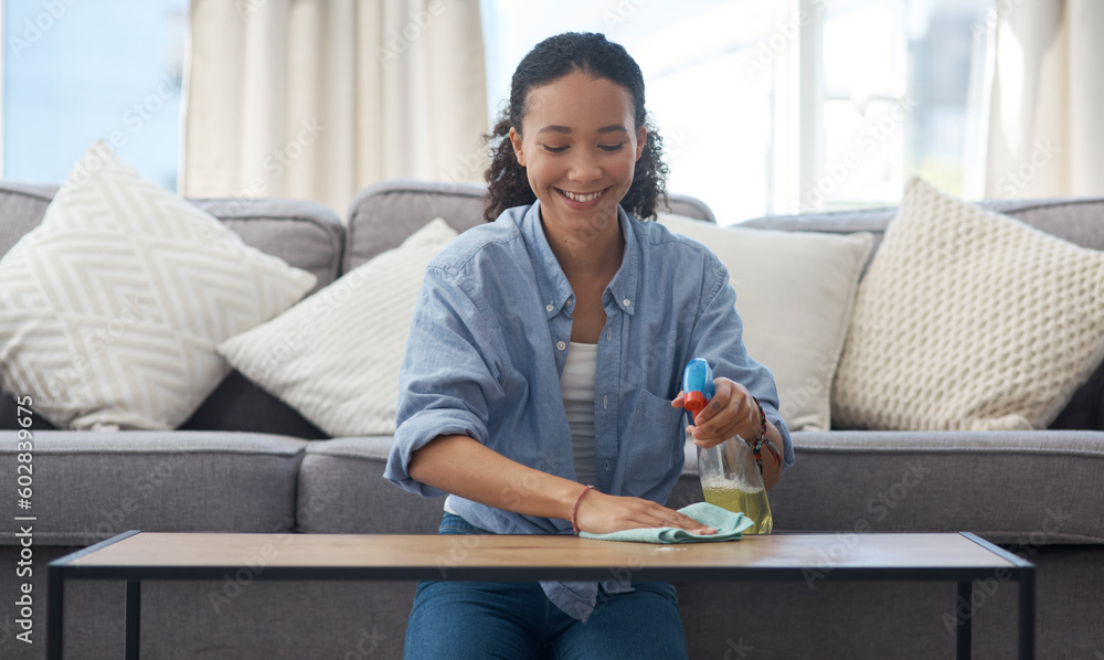 Happy woman, cleaner and spray bottle, wipe table with detergent and ...