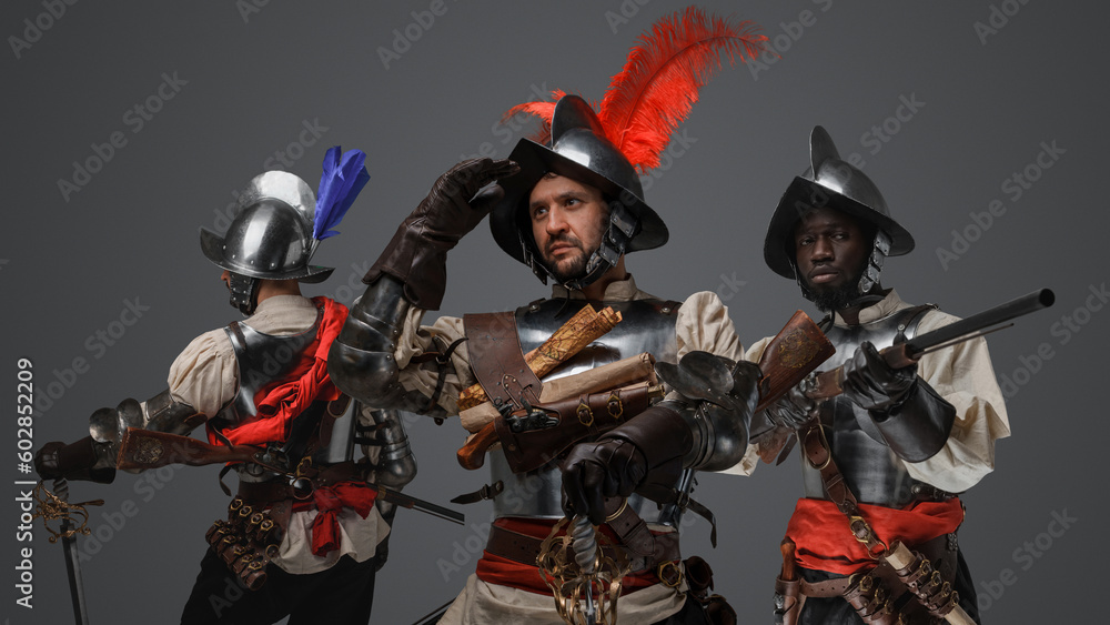 Shot of medieval spanish soldiers with flintlock guns and cuirasses ...