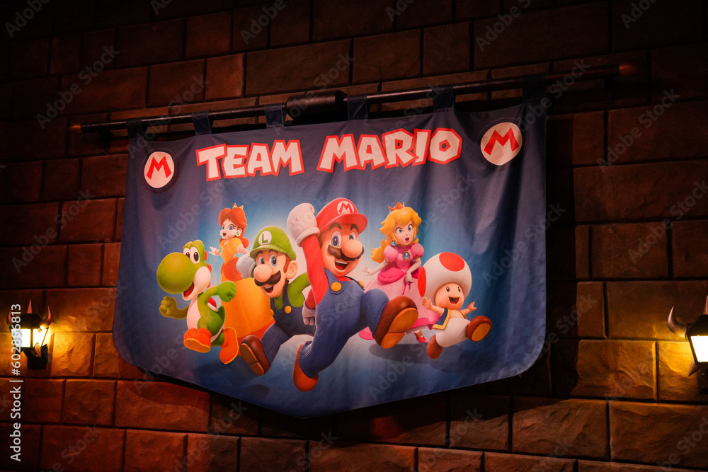 Japan - April 03, 2023: Team Mario flag included many characters such ...