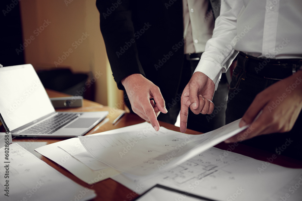 Two engineers pointing at drawings project, Architect team meeting ...