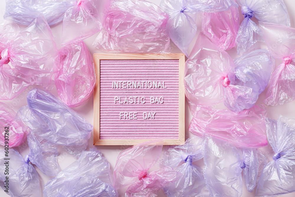 International Plastic Bag Free Day text on felt board with disposable ...