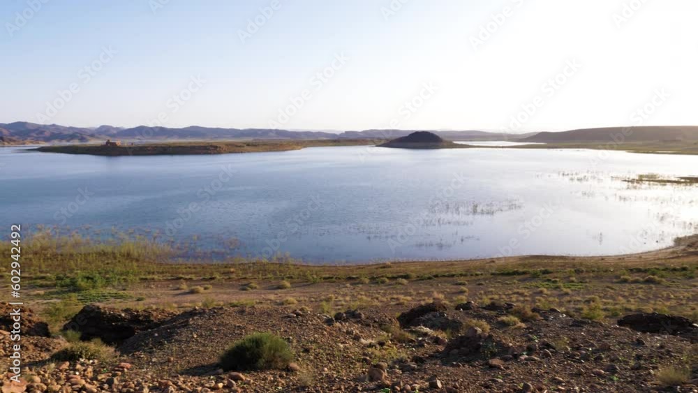 Lake El Mansour Eddahbi dam water reservoir in Ouarzazate, Morocco. Low ...