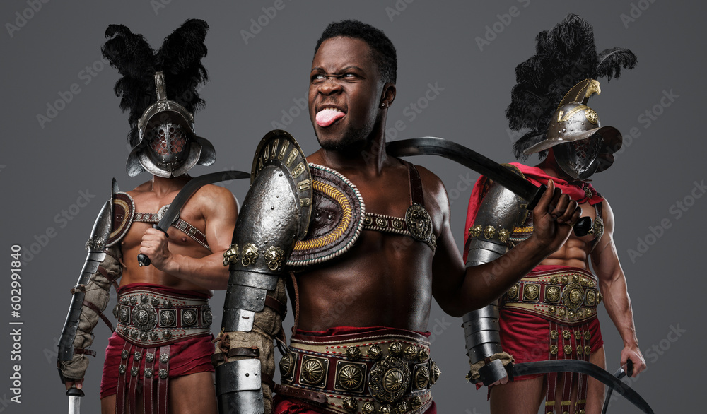Portrait of mad african gladiator from past with paired swords and two ...