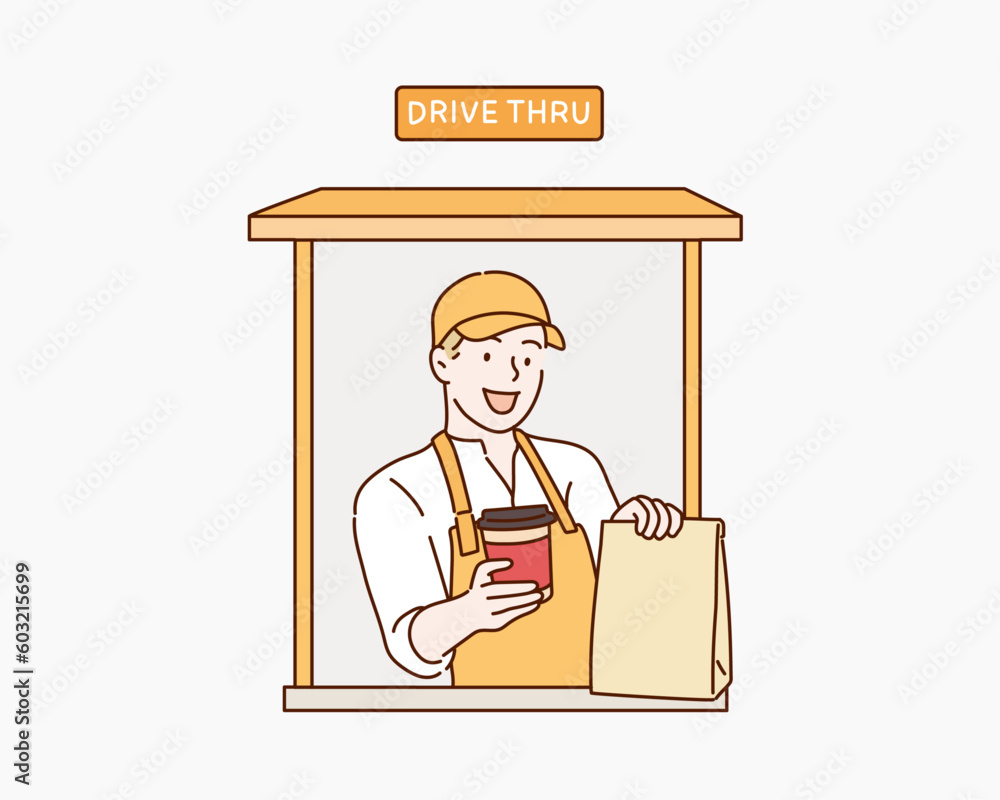 Fast food restaurant worker ready gives a customer order at a drive ...