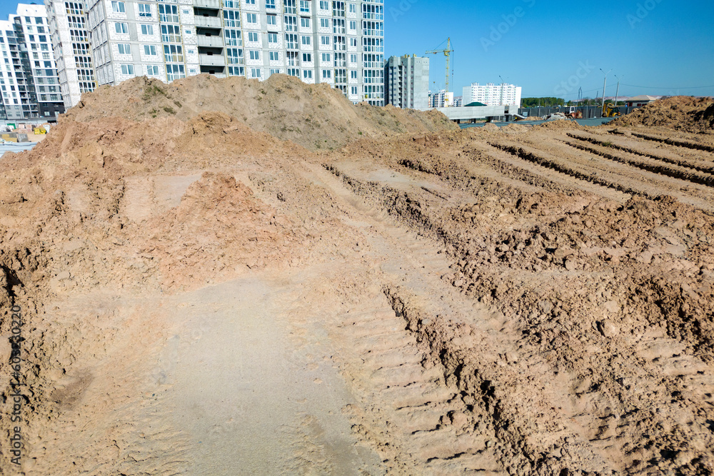 Open sand pit, for sand extraction during construction. The texture of ...