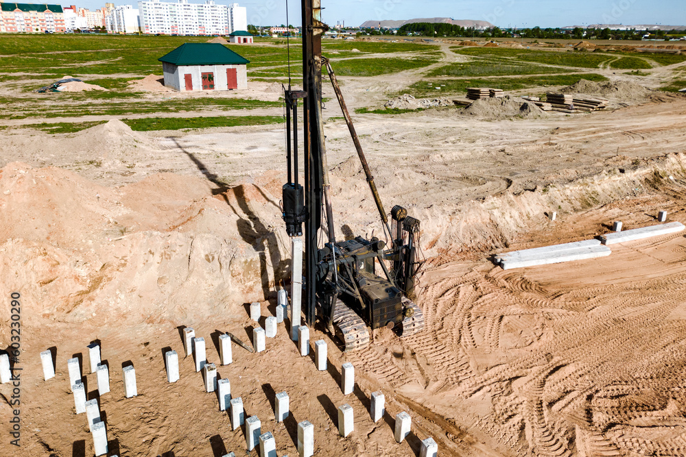 Pile driving machine. Diesel hammer pile driving machine working on ...