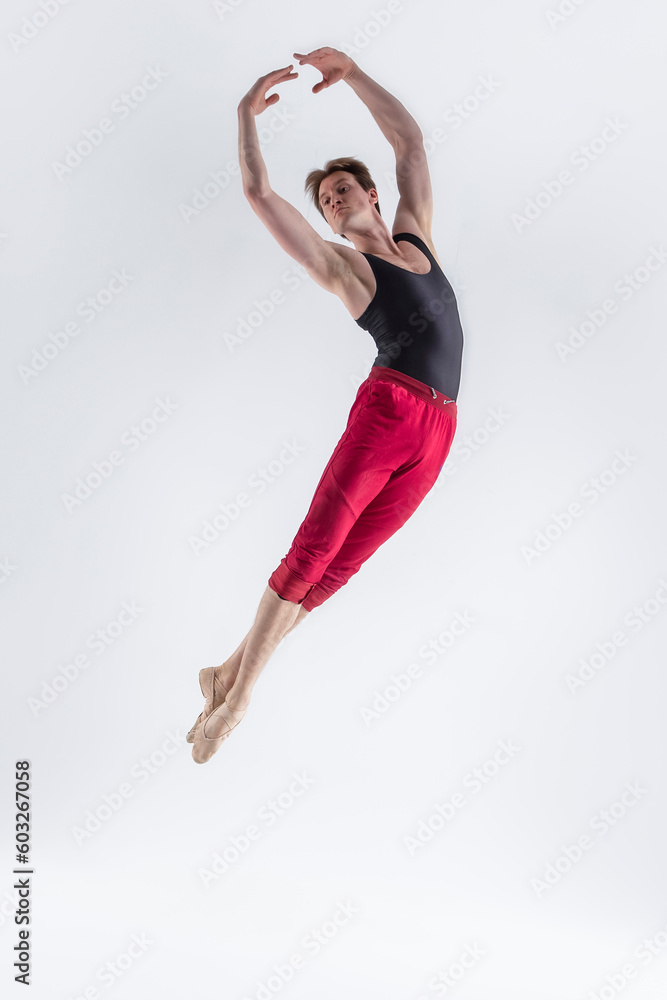 Ballet Dancer. Art Ballet With Young Flexible Athletic Man Posing in ...