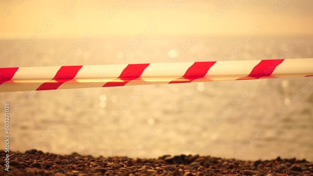 Vidéo Stock Red white warning tape barrier ribbon swinging in the wind ...