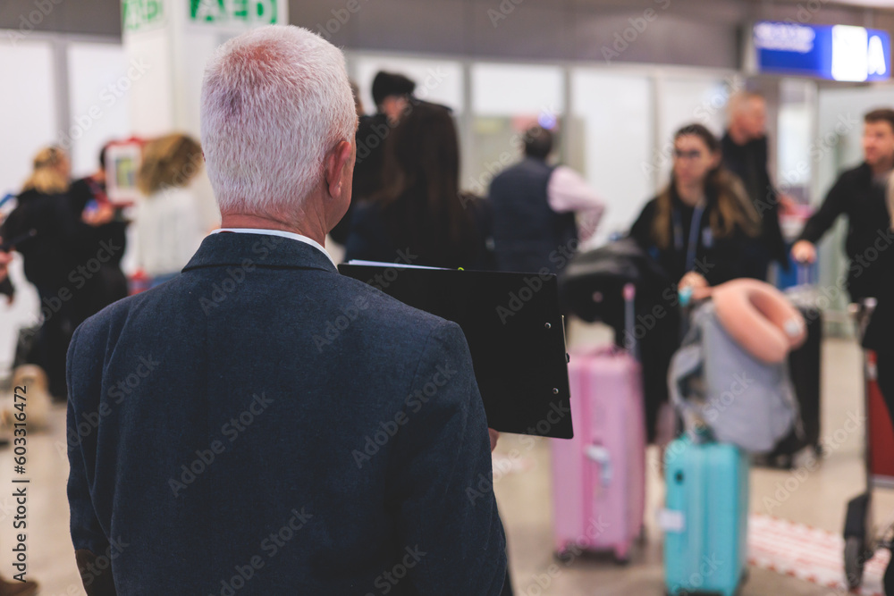 Meeting at the airport, person holding a placard card sign with welcome ...