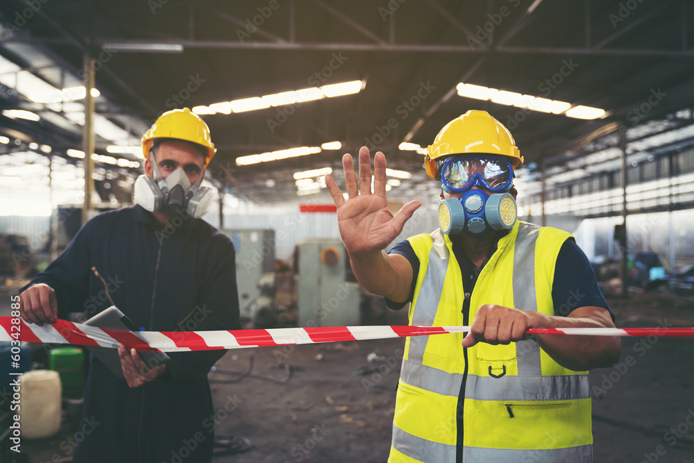 Group of chemical specialist wear safety uniform, gas mask showing ...