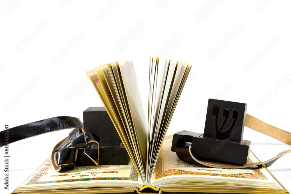 Tefillin or phylacteries . Pair of black leather boxes for the arm and ...