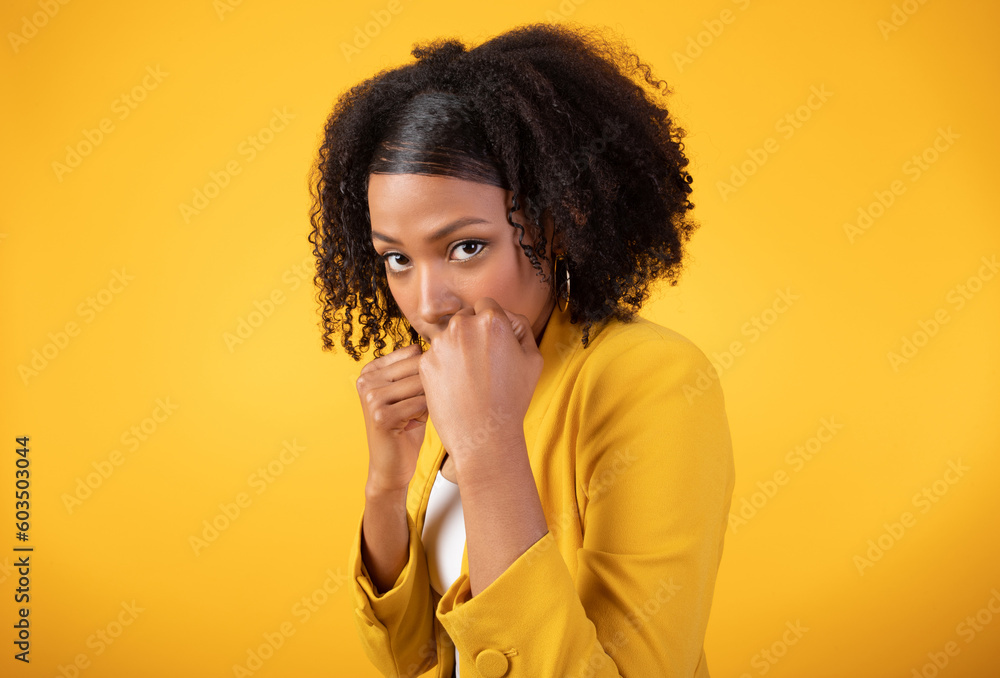 Aggressive angry black woman ready to fight, boxing to camera with ...