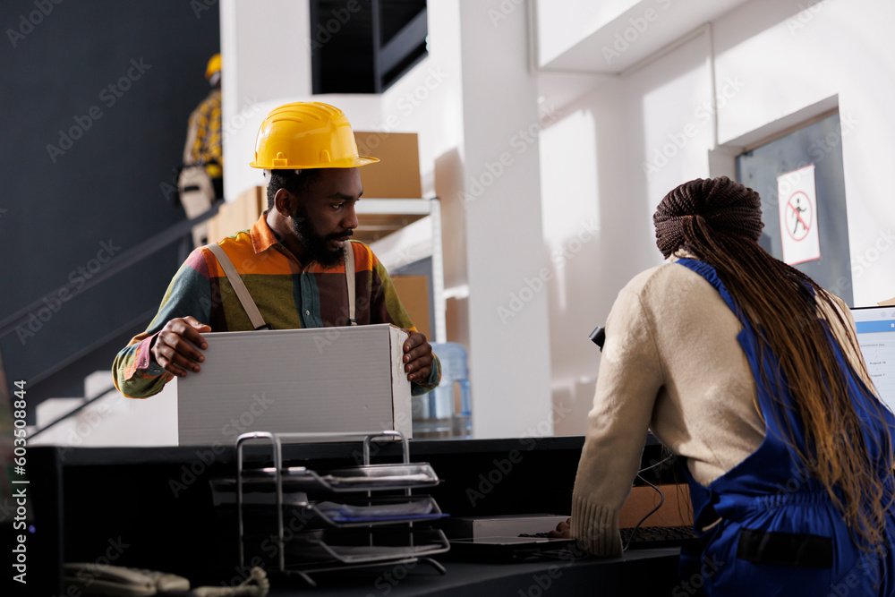 Shipment manager waiting for parcel electronic invoice at reception ...