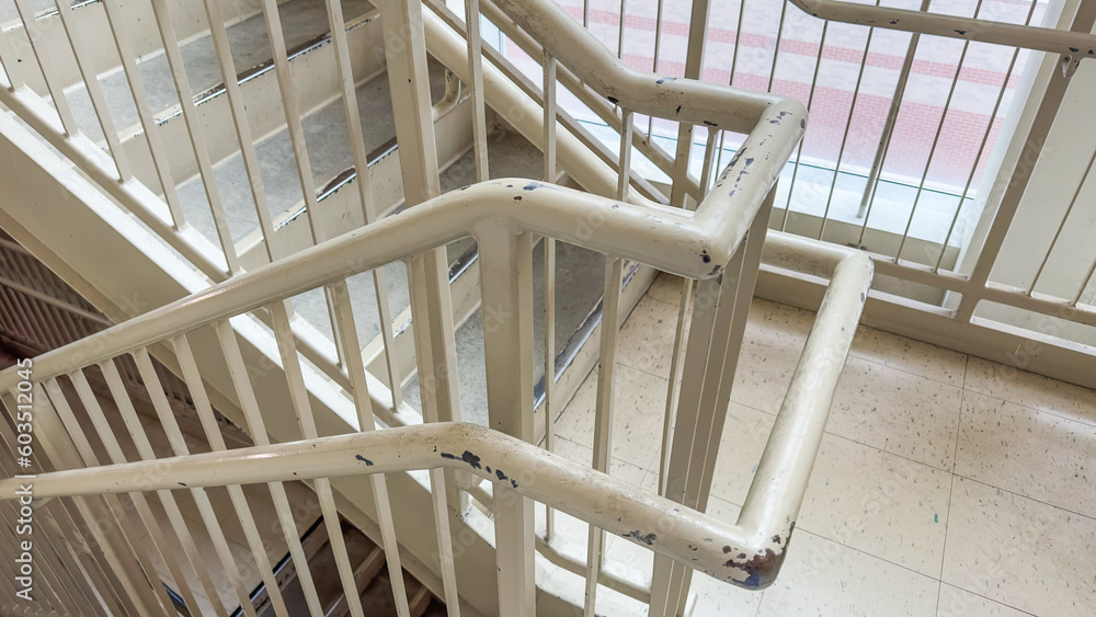 Staircase and side railings symbolize ascension, progression, and ...