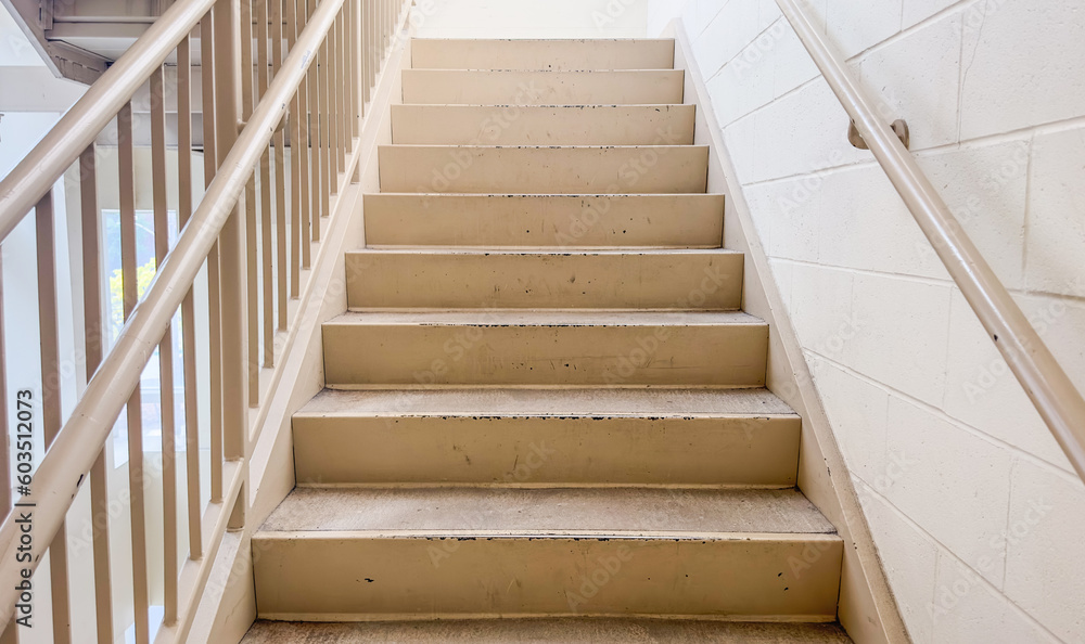 Staircase and side railings symbolize ascension, progression, and ...