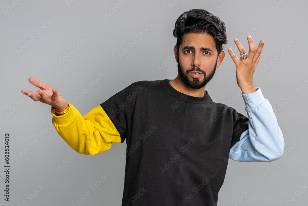 No idea, I dont know answer. Puzzled clueless uncertain indian handsome ...