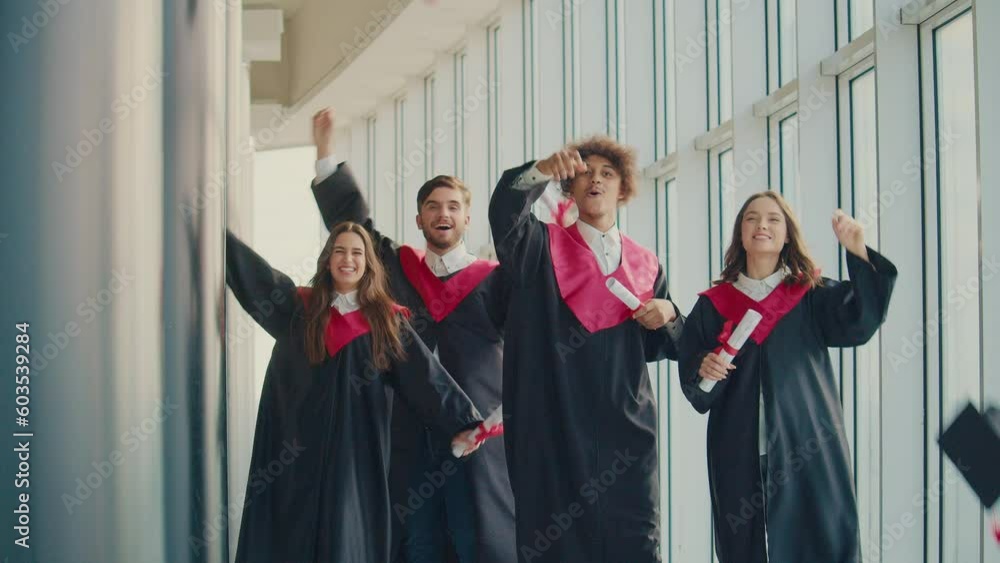 Positive Group of Successful Graduates Happy Throw Up the Graduation ...