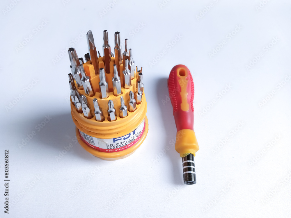 The screw-driver with a set of various nozzles. Interchangeable ...