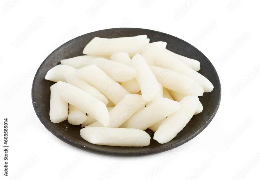 Tteok or Korean Rice Cakes in plate isolated on white background. pile ...