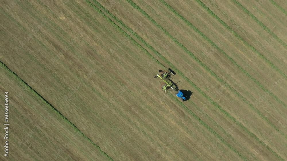 Vidéo Stock Above top view dolly move parallel, follow tractor as tow ...