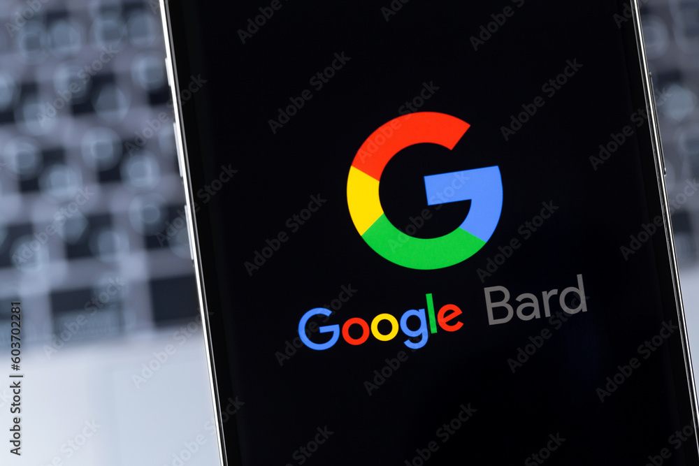 Google Bard logo on a smartphone iPhone screen closeup. Bard is a conversational generative ...