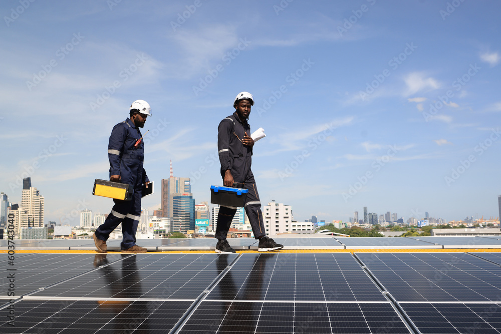 Electrical engineer team wearing safety PPE handle tool box walk on ...