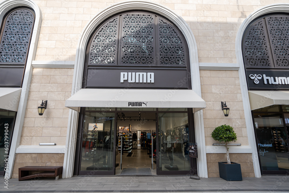 Puma sign and logo in The Land of Legends Shopping Avenue. Antalya ...