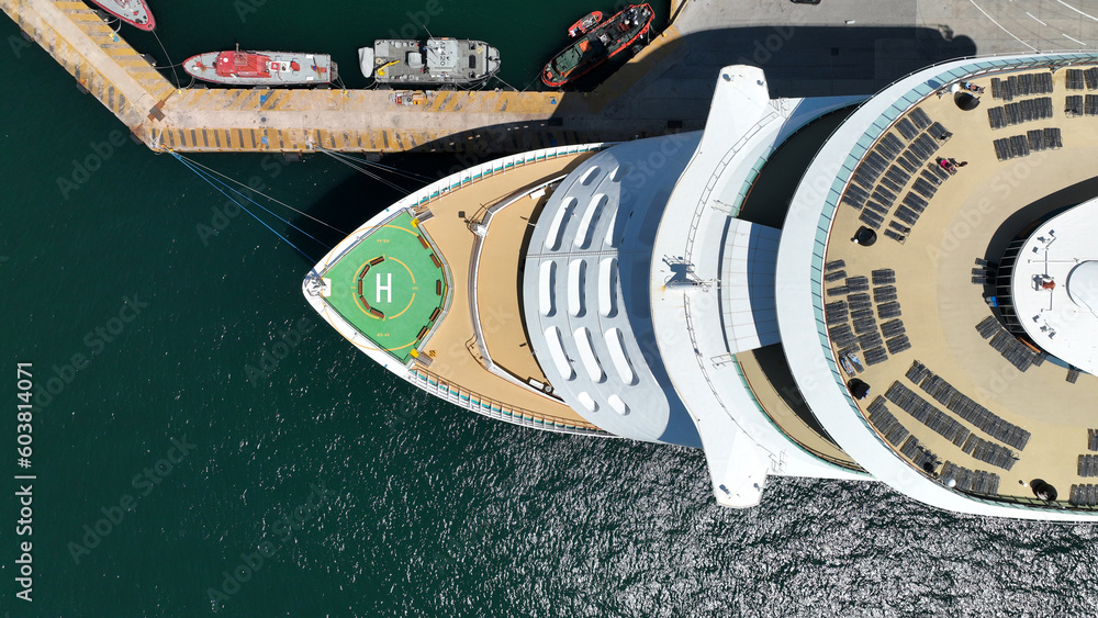 Aerial drone top view of crowded cruise liner ship with pool facilities ...