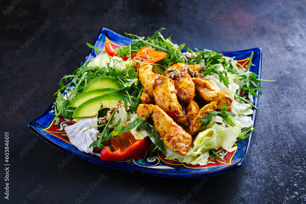 Traditional German iceberg and Italian arugula salad served with ...