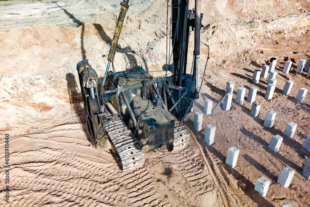 Pile driving machine. Diesel hammer pile driving machine working on ...