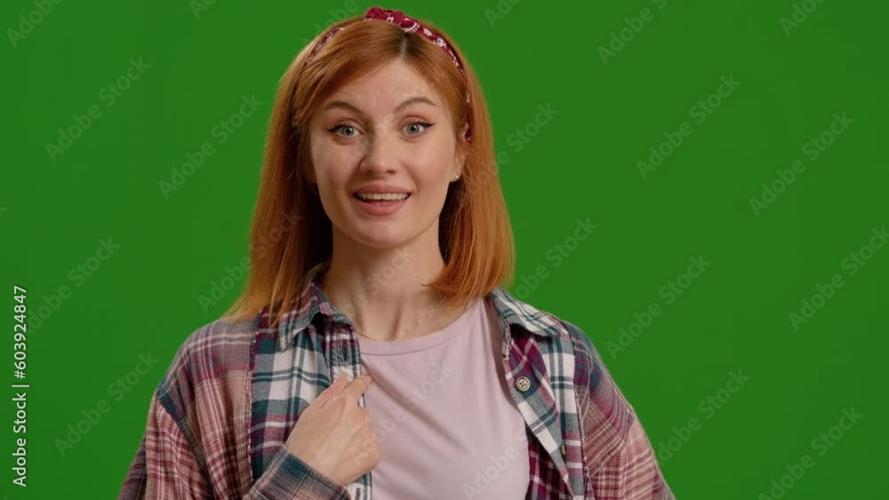 Unexpected reaction on face of female being promoted on green screen ...