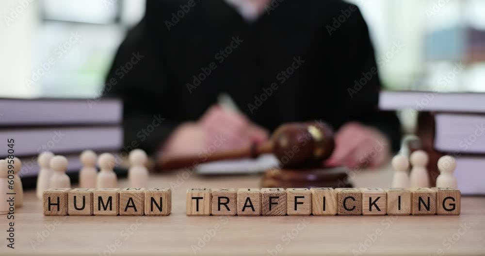 Word Human Trafficking and judge in courtroom. Slave trade and ...