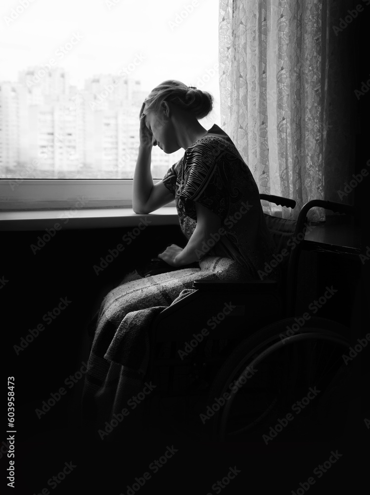 Sad girl at the window Stock Photo | Adobe Stock