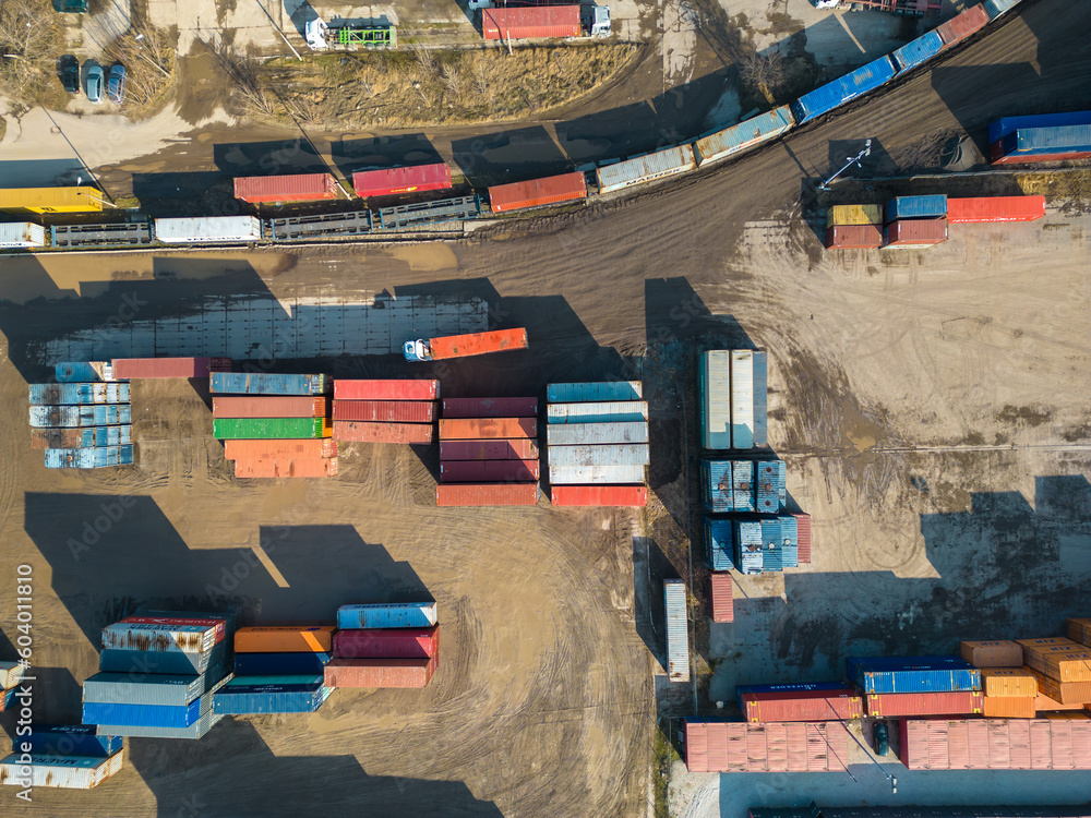 Cargo trains close-up. Aerial view of colorful freight trains on the ...