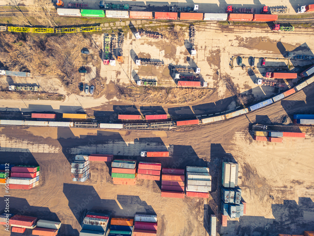 Cargo trains close-up. Aerial view of colorful freight trains on the ...