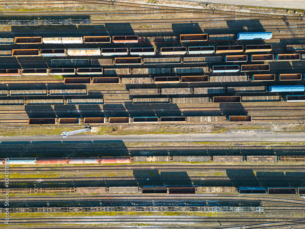 Cargo trains close-up. Aerial view of colorful freight trains on the ...