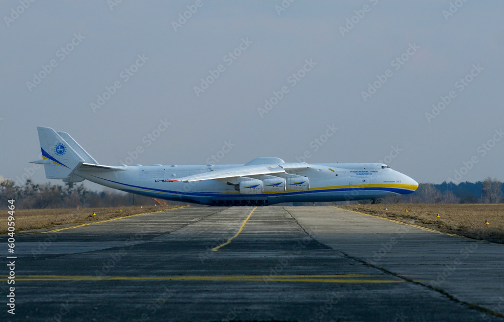 Airlift cargo aircraft Antonov 225 Mriya taking off from a runway of ...