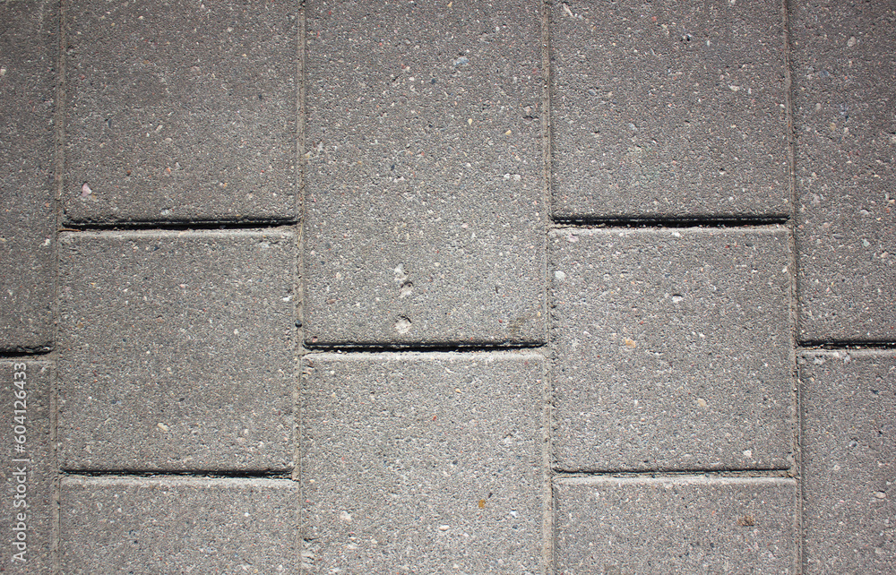 Gray background of a brick pavement.Background of a block of gray stone ...