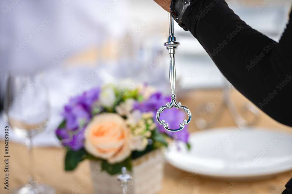 Bartender waiter use white cloth wipe wine glass for afternoon tea ...