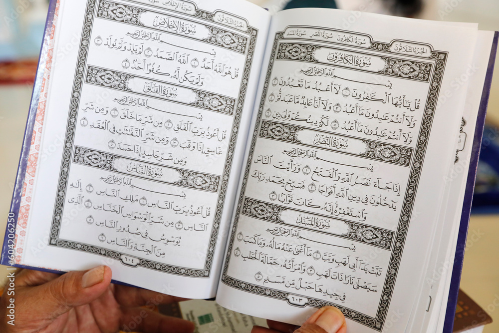 Masjid Nia'mah Mosque, Muslim man reading the Holy Quran, Chau Doc ...