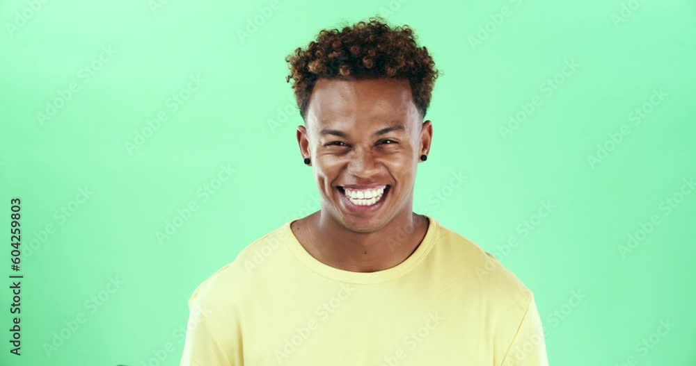 Face, funny and man laughing on green screen in studio isolated on a ...