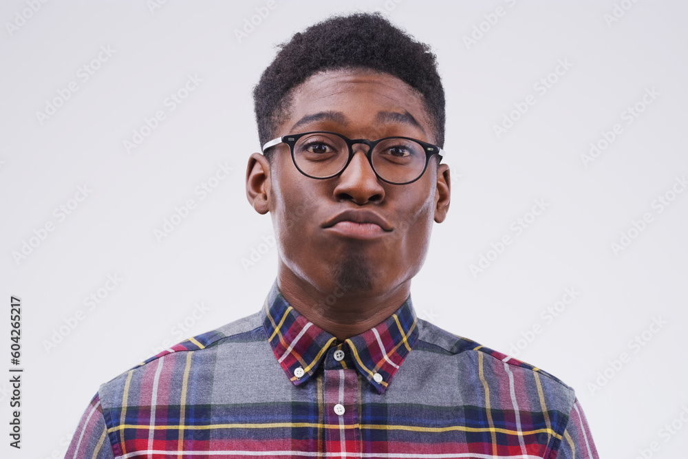 Funny face, young and portrait of a black man pouting isolated on a ...