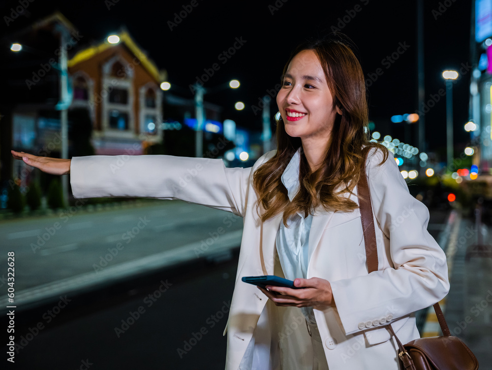 Beautiful woman smiling using smartphone application hailing with hand ...