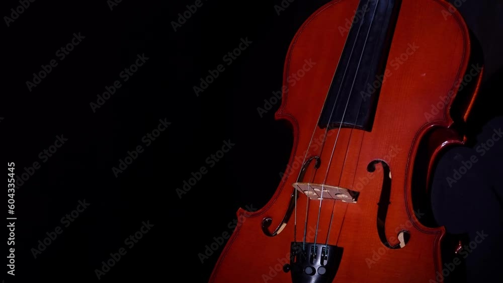 Violin, light appearing and revealing a beautiful violin, 4k, selective ...