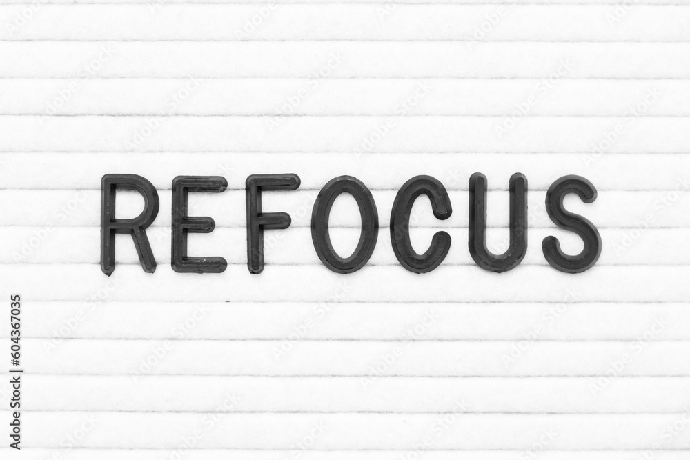 Black color letter in word refocus on white felt board background Stock ...